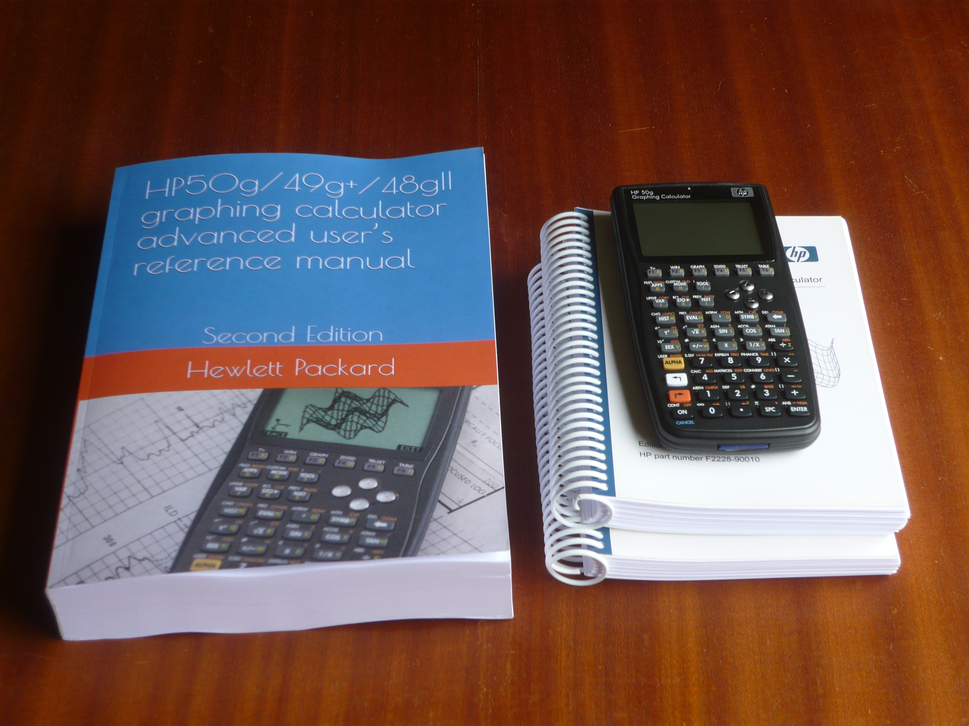 Printed HP 50g User's Guide and Advanced User's Reference manuals - 3rd batch